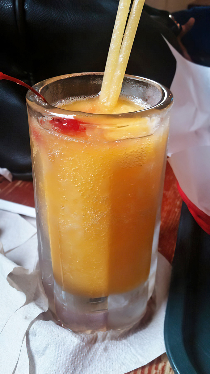A proper Texas meal deserves a proper Texas beverage—this sunset-colored margarita provides the perfect cooling counterpoint to burger perfection.