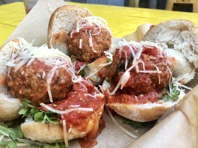 These meatball sliders aren't playing around. Perfectly sauced, properly cheesed, nestled in fresh bread—Italian-American heritage in three perfect bites.