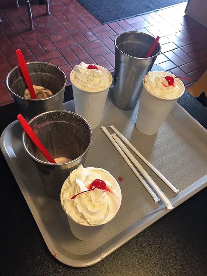 Milkshakes thick enough to require serious straw commitment. That cherry on top isn't garnish—it's the exclamation point at the end of a dairy declaration.
