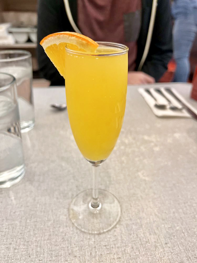 Sunshine in a glass—this mimosa isn't just a brunch accessory, it's practically a vitamin supplement. At least that's what I tell myself.