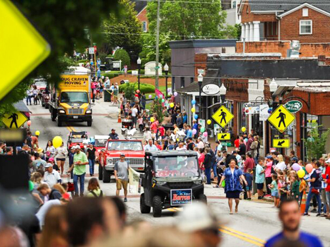 Small-town parades: where fire trucks move at walking speed and everyone waves like they're auditioning for royalty. Pure Americana in motion.