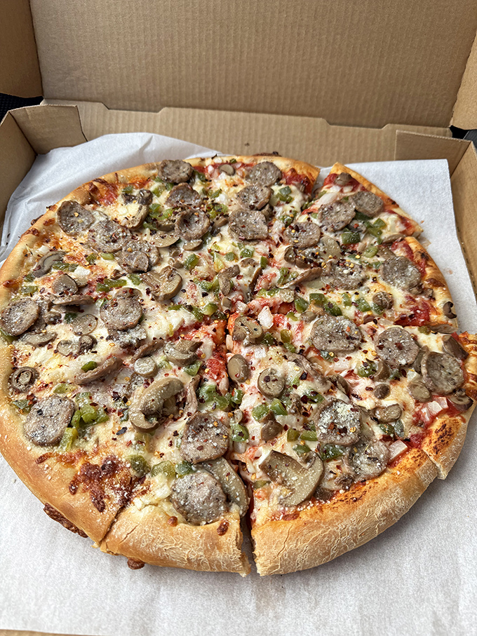 A mushroom and sausage symphony where each ingredient knows exactly when to take center stage. Pizza as nature intended.