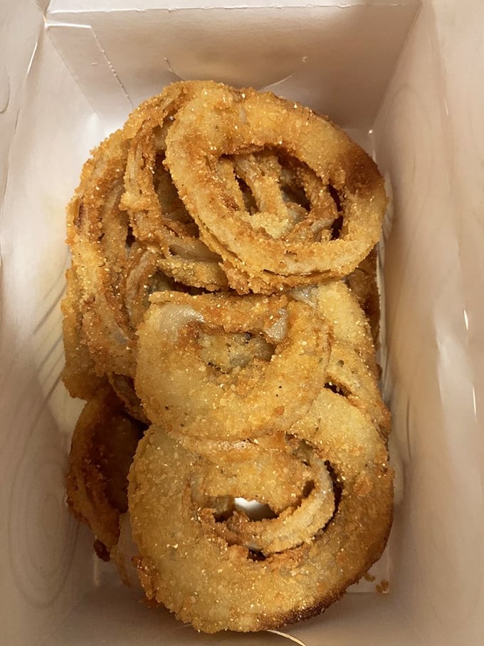 These aren't just onion rings; they're golden halos of happiness. Crispy, light, and begging to be dunked in sauce.
