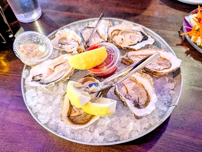 Oysters on ice, glistening like jewels from the deep. Add a squeeze of lemon, and you're tasting the ocean at its most primal and perfect.