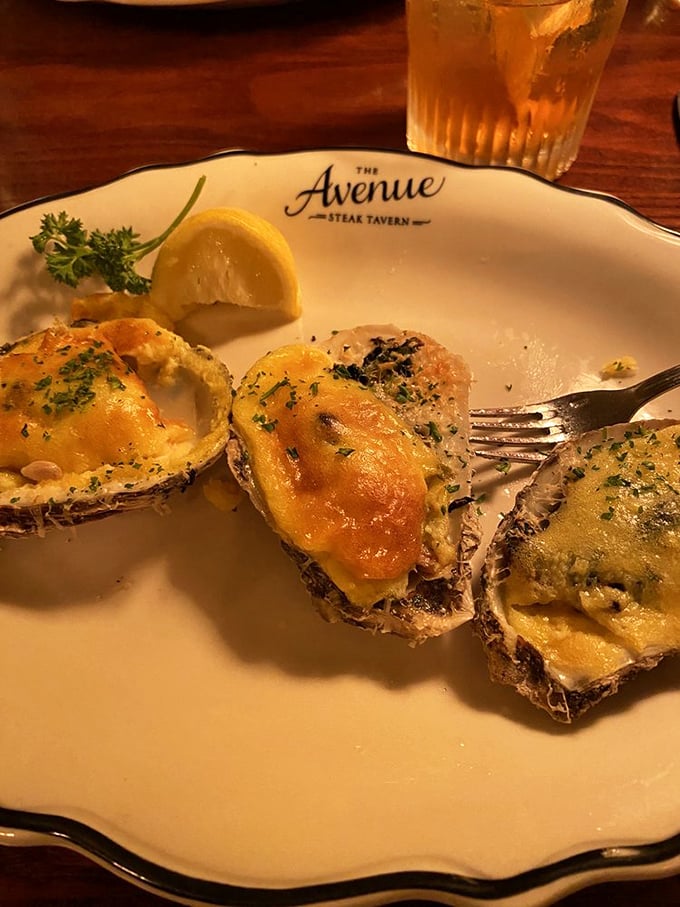 Oysters Rockefeller done right – bubbling with cheese and herbs. The kind of appetizer that makes you consider skipping the main course.