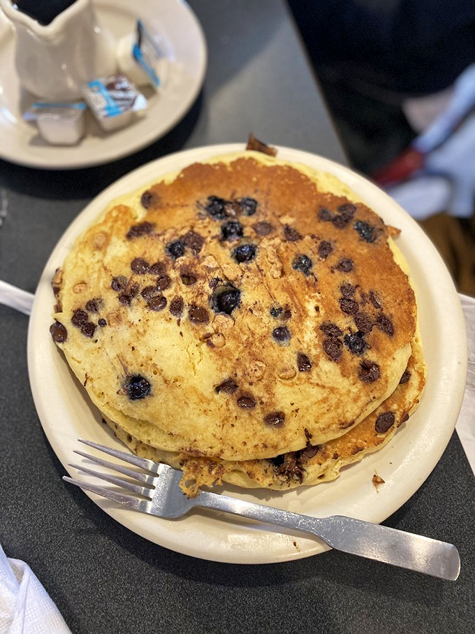 Pancakes studded with chocolate chips and blueberries – breakfast's answer to having your cake and eating it too, guilt-free.