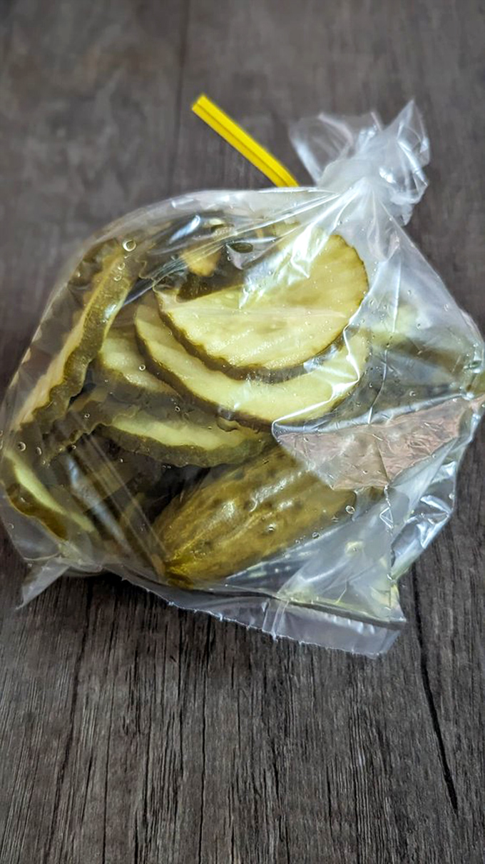 The humble pickle—tangy, crunchy time machines to grandma's kitchen—awaits its supporting role in the sandwich drama about to unfold.