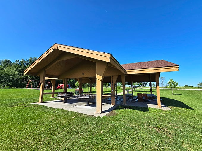 Picnic shelter perfection—where "roughing it" means forgetting the extra napkins. The ideal basecamp for beach day operations.