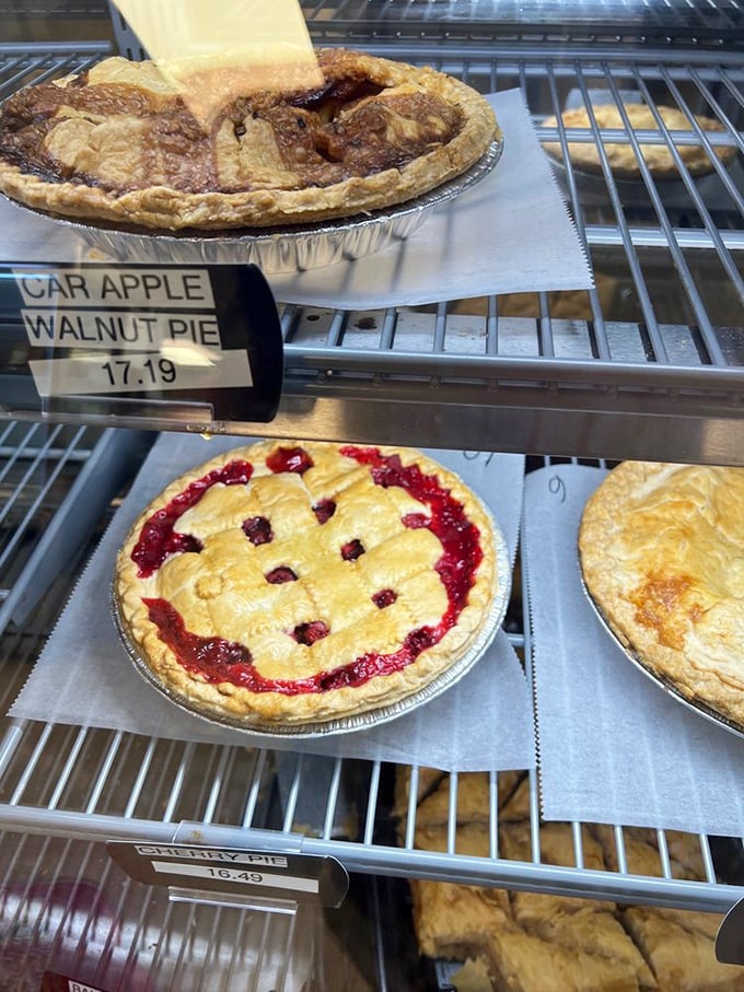 Beyond tomato pies, their fruit pies showcase the bakery's versatility—that cherry lattice looks like it jumped straight out of a Norman Rockwell painting.