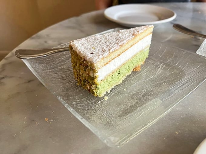 Layer upon layer of pistachio perfection that makes you wonder why chocolate gets all the dessert glory – a verdant revelation on a plate.
