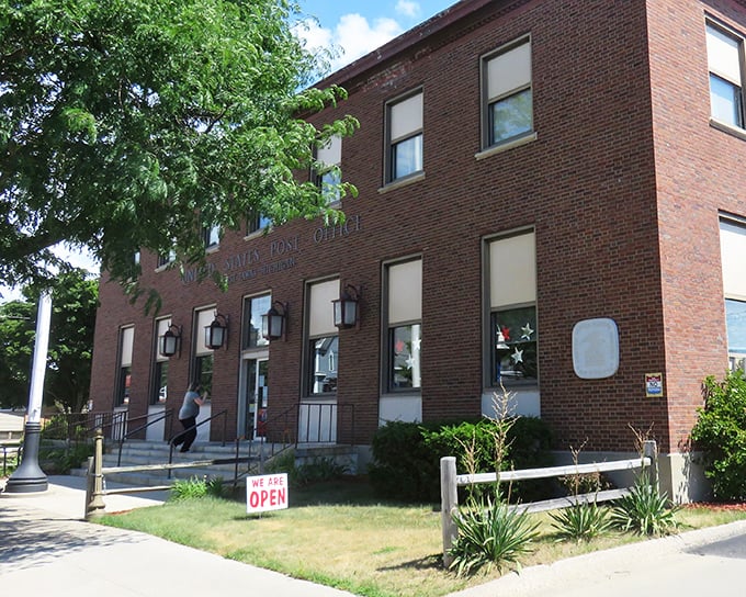 The East Tawas Post Office stands as a brick testament to civic architecture. Mail delivery: bringing communities together since forever.