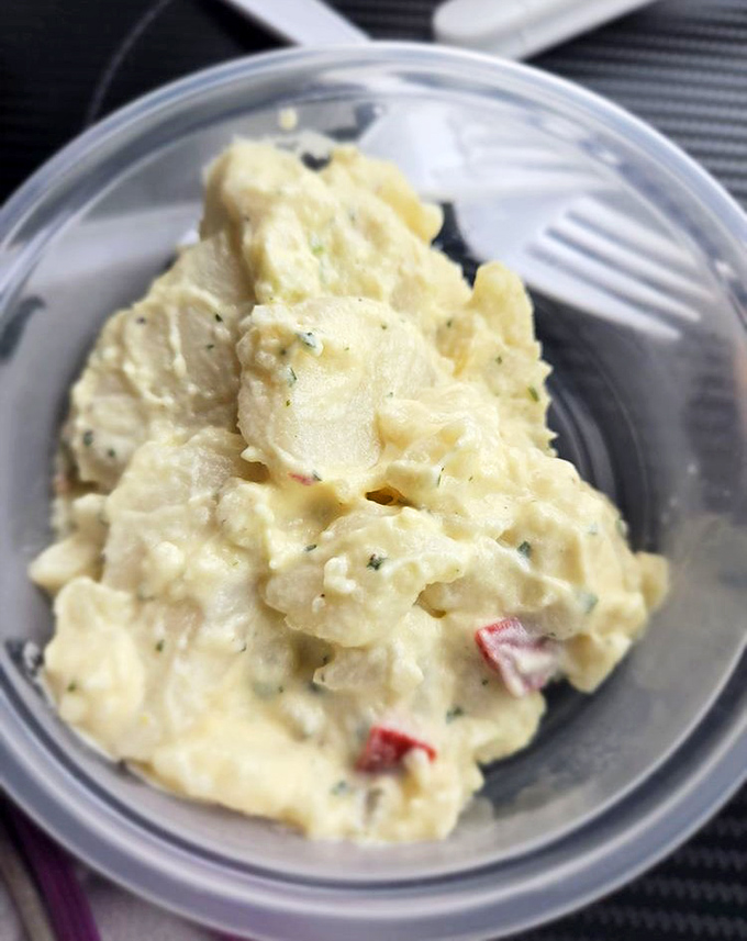 Potato salad that doesn't apologize for being exactly what it is – creamy, hearty, and the perfect sidekick to seafood's main character.