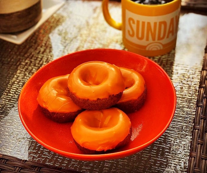 These pumpkin donuts aren't just breakfast, they're autumn on a plate – the kind of simple pleasure that makes Monday feel like Saturday.