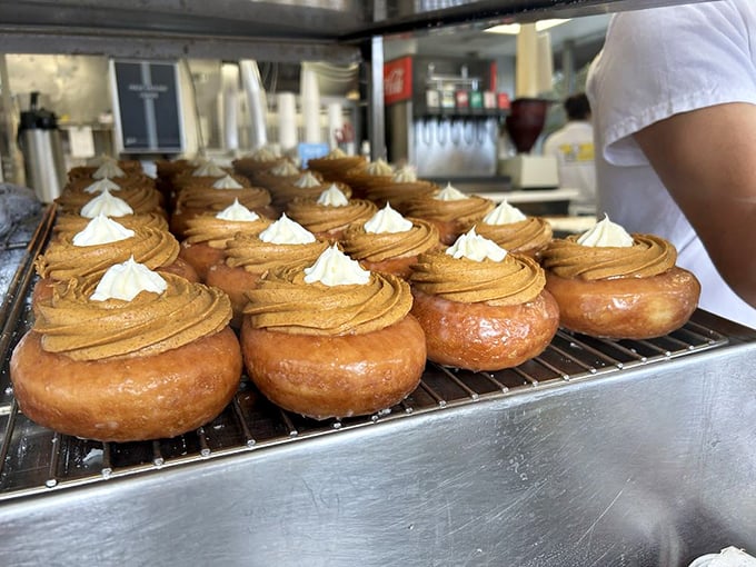 Fall arrives with these pumpkin cream donuts—a spiced seasonal offering that makes waiting for the strawberries' return a little more bearable.