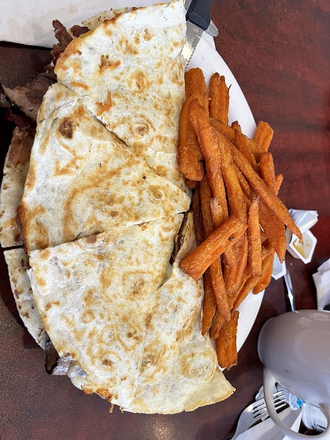Some quesadillas are merely vehicles for cheese—this one's a full-fledged flavor expedition with sweet potato fries riding shotgun.