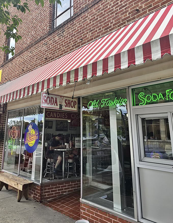 Rocky's Grill & Soda Shop – where milkshakes are still served thick enough to require both a straw and a spoon, just as the universe intended.