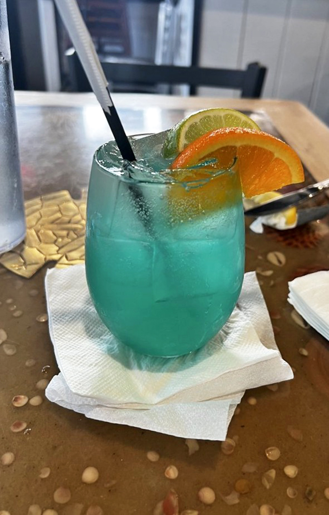Electric blue and vacation-ready, this seafoam sangria isn't just a drink—it's liquid escapism with citrus accents and Instagram appeal.