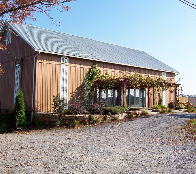 Shade Mountain Winery's rustic barn exterior belies the sophisticated pours within. Country charm meets vineyard finesse in perfect Pennsylvania harmony.