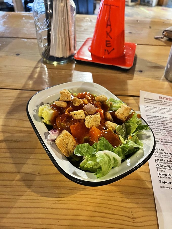Even the side salad gets the northwoods treatment! This isn't some afterthought greenery – it's a proper, hearty companion to wilderness dining.