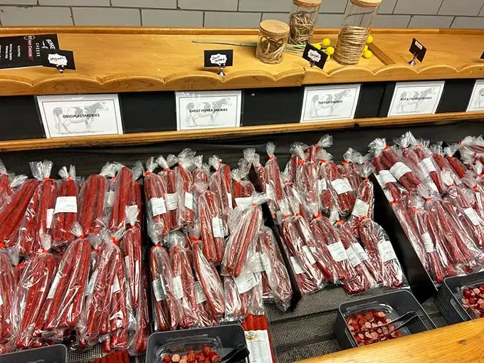 The smokies display is a meat-lover's paradise. These aren't your gas station meat sticks—these are artisanal flavor bombs waiting to happen.