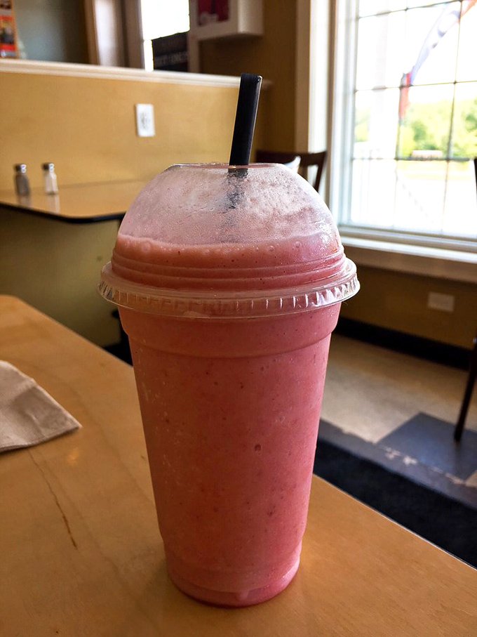 That strawberry smoothie isn't just pink—it's practically blushing from all the compliments it receives. Summer in a cup, no matter the season.