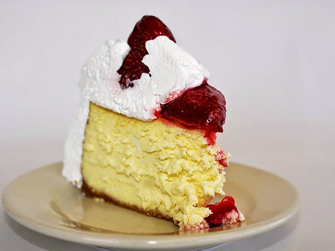 Strawberry cheesecake so rich it probably has its own accountant. One bite and you'll understand why people dream about this.