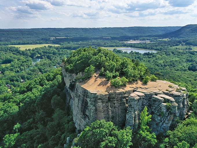 Sugarloaf Mountain rises from Greers Ferry Lake like nature's monument to persistence – a dramatic limestone bluff that refused to become just another underwater feature.