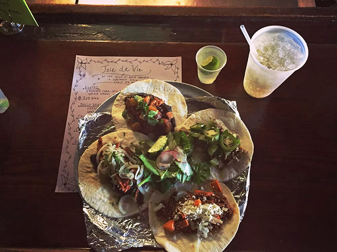Tacos that tell a story of cultural fusion—where New Orleans meets Mexico on a handmade tortilla. The garnishes add color like confetti at a flavor parade.