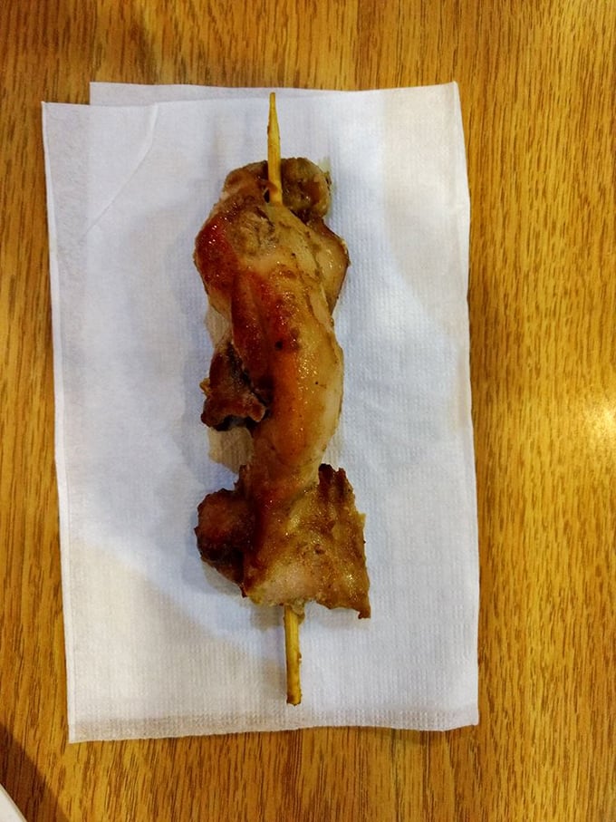 A simple chicken skewer that somehow manages to stay juicy under heat lamps – the buffet equivalent of finding a unicorn.