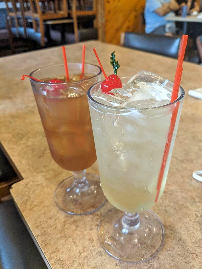 Vacation in a glass: The Tinkerbelltini and Captain Hook Mai Tai bring theme park fun to happy hour without the long lines or expensive tickets.