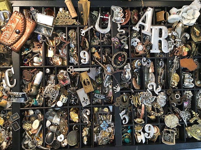 This printer's drawer of trinkets and treasures is like a physical Pinterest board—each compartment holding someone's future conversation piece.