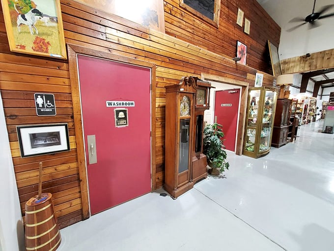 Even the washroom area maintains the vintage aesthetic, with warm wood paneling and period-appropriate fixtures creating a seamless historical experience.