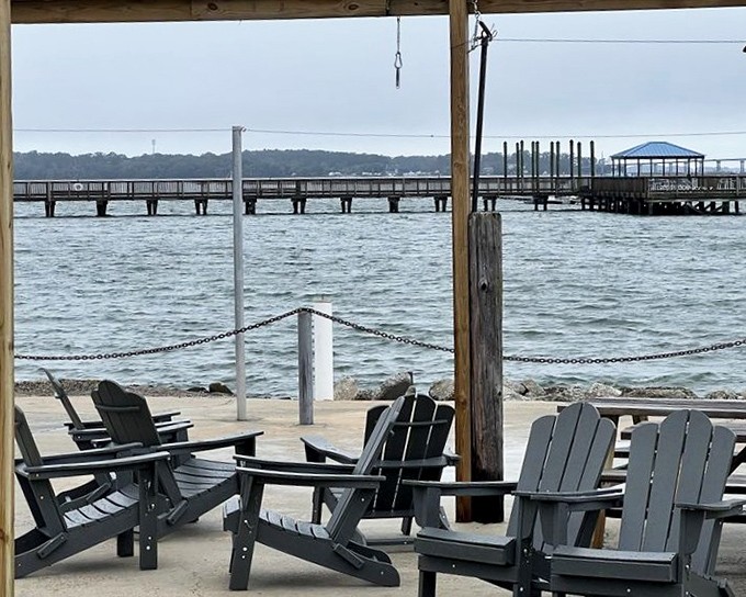 Adirondack chairs facing the water create nature's waiting room. The view alone is worth whatever time you'll spend waiting for a table.