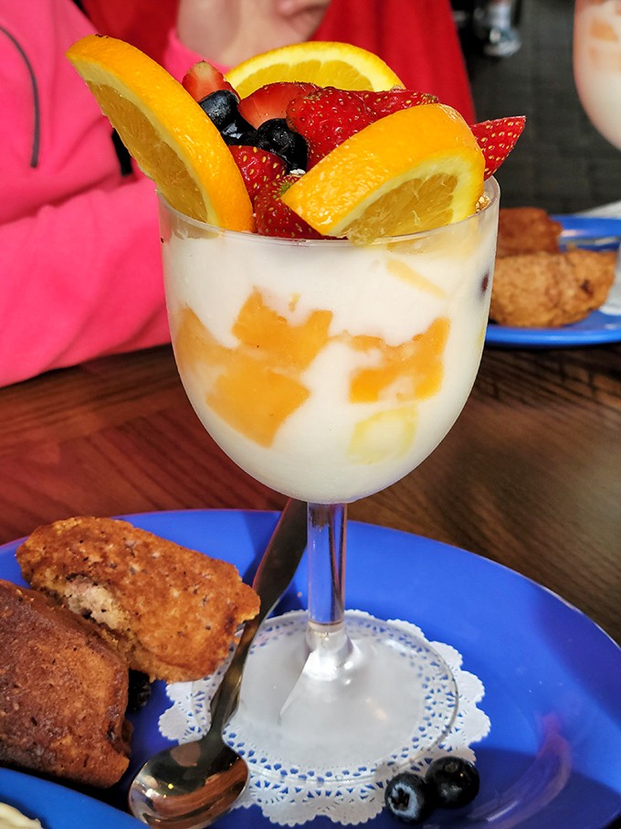 Breakfast goes elegant with this parfait—layers of yogurt and fruit creating a morning symphony that's both virtuous and indulgent.