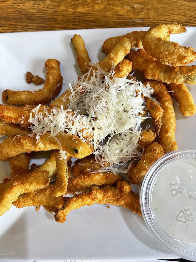 Parmesan-dusted zucchini fries that somehow make eating vegetables feel like breaking the rules. The ranch dipping sauce seals the deal.