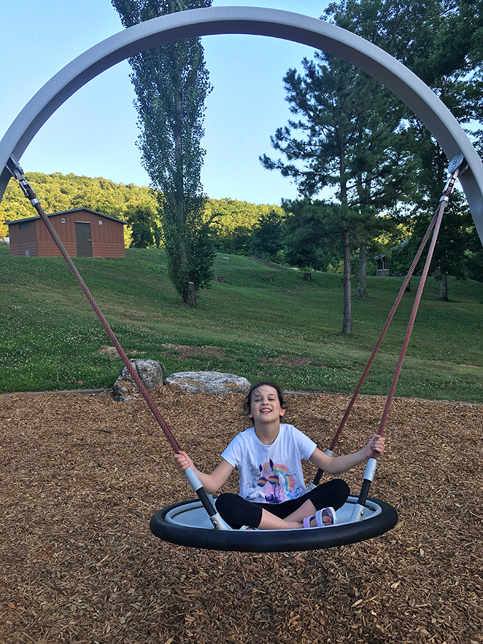 Childhood joy in adult-sized packages! This oversized swing proves you're never too old for playground thrills—especially with a view this good.