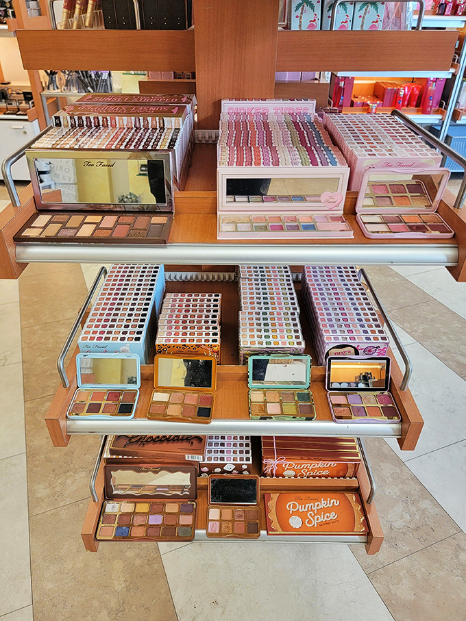 Makeup palettes arranged in tempting rows—like a dessert buffet for your face where "just one more" becomes the shopper's mantra.
