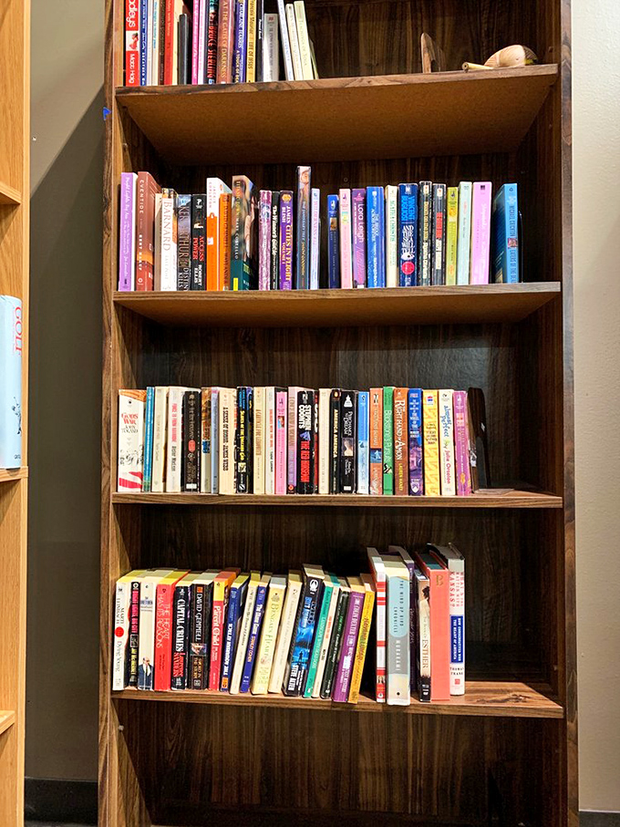 Books stacked like literary layer cakes, each shelf a different flavor of imagination. Paperback treasures at pocket-change prices.