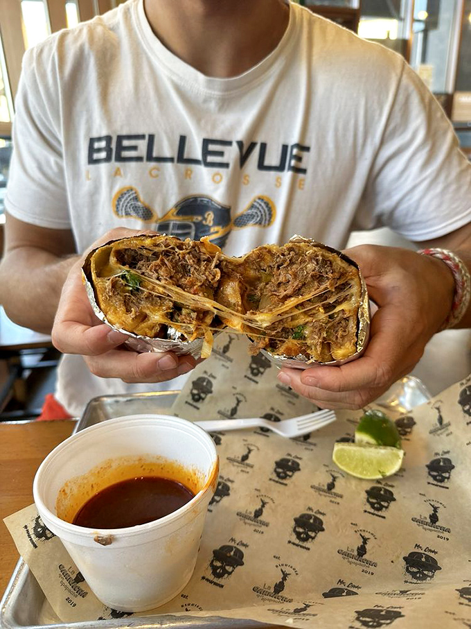 The cheese pull on this quesabirria would make a pizza commercial jealous. That consomé cup is liquid gold for dipping.