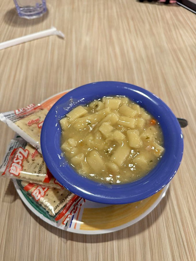 Comfort in a blue bowl—this chicken noodle soup doesn't need fancy ingredients, just the power to cure whatever ails you.