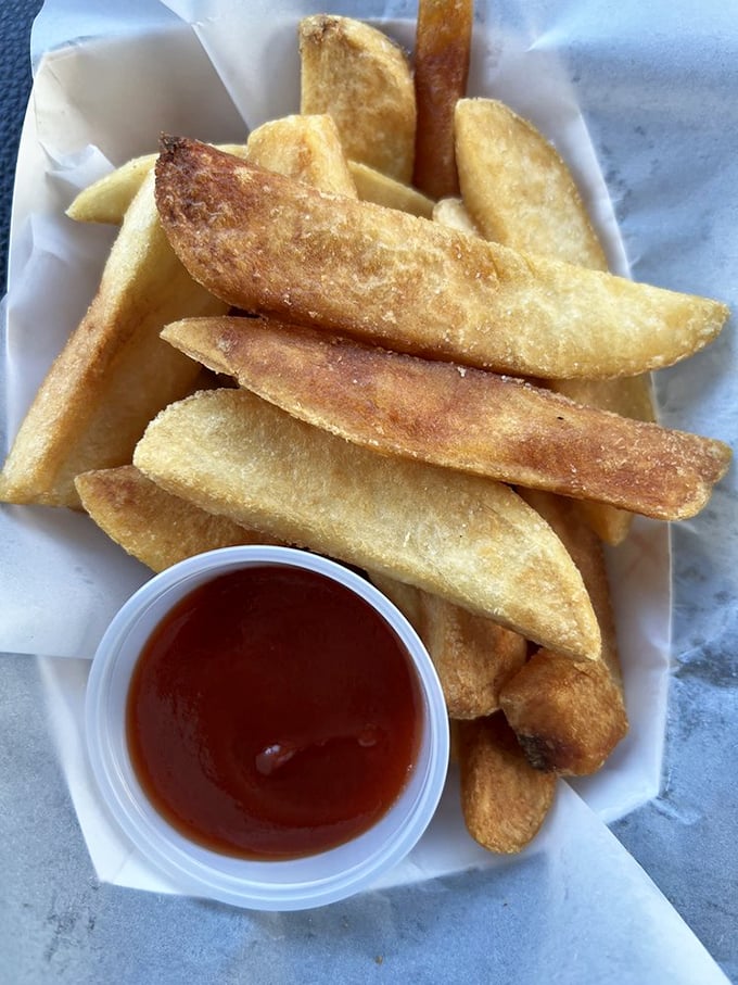 These aren't just fries—they're the supporting actors who occasionally steal the scene from the star. Crispy, fluffy potato perfection.