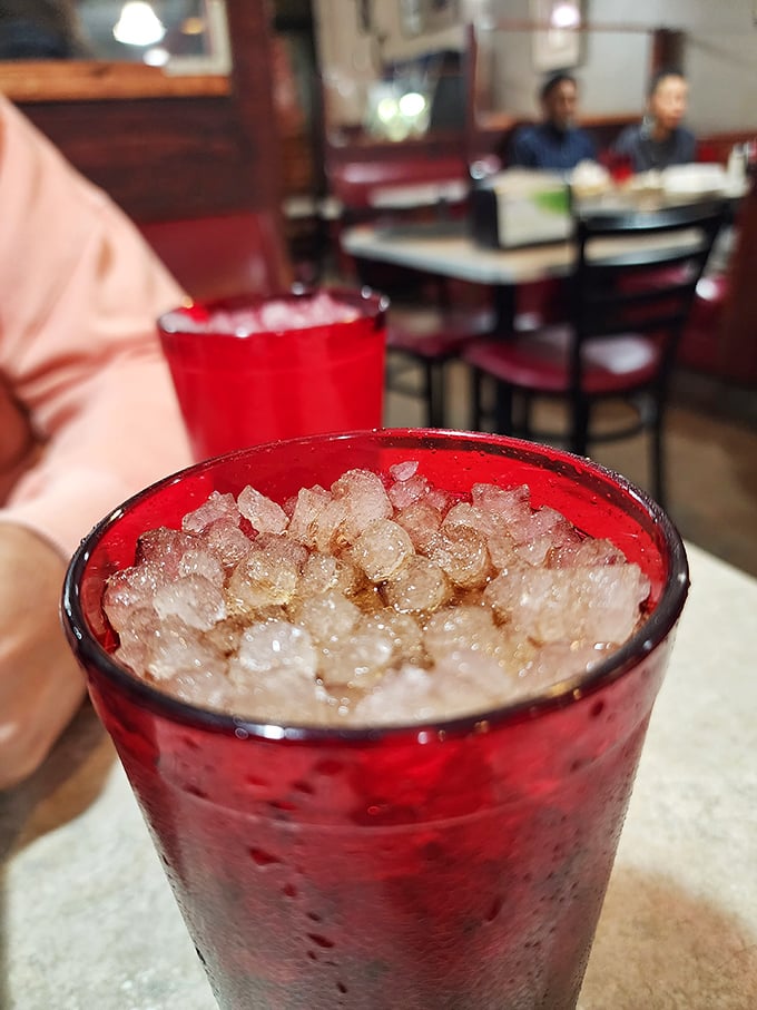 The ruby-red glow of a classic Coke with pellet ice—the unsung hero of diner dining and the perfect chili companion.