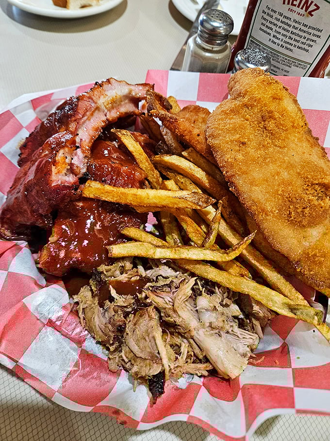 A carnivore's dream platter that would make Ron Swanson proud. Three different proteins sharing real estate on a red-checkered battlefield of deliciousness.