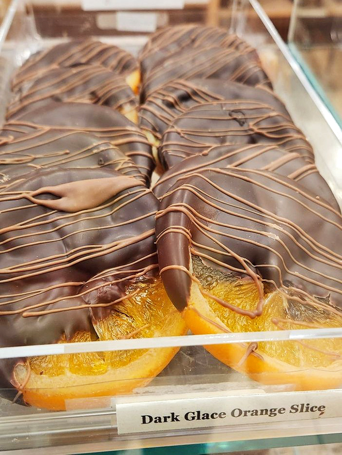 Dark chocolate-draped orange slices that make fruit count as dessert—a loophole your nutritionist secretly approves.