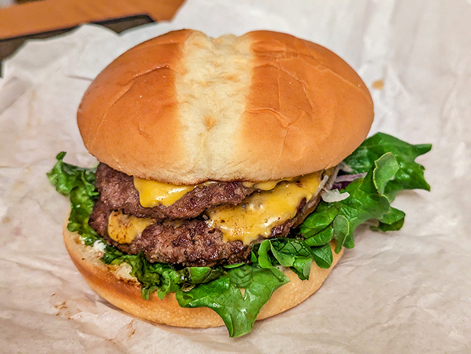This double cheeseburger doesn't just satisfy hunger – it conquers it. Two perfectly charred patties with melted cheese create the ultimate comfort food masterpiece.
