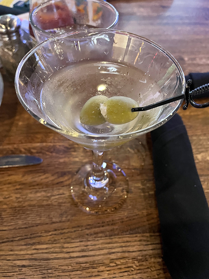 A classic martini with olives – because sometimes civilization is measured not by our technological advances, but by how well we chill vermouth.
