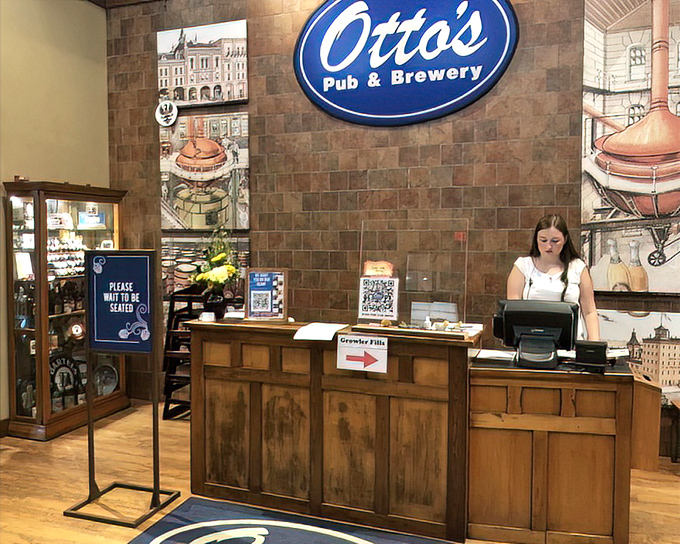 The host station—first checkpoint on your journey to happiness—where they don't just take your name, they take your hunger seriously.