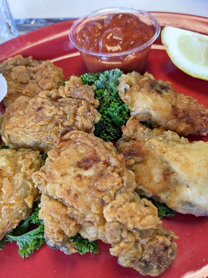 These golden-fried oysters aren't just seafood—they're little crispy treasures from the Pacific, served with a sauce worth bottling and selling.