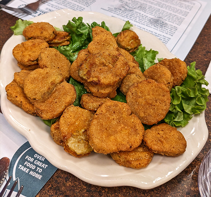 Fried pickles: The unsung heroes of deli appetizers. Crispy, tangy, and utterly addictive – they're what potato chips dream of becoming someday.