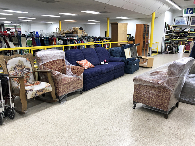 Furniture that's seen a few dinner parties and family gatherings, now waiting for its next chapter. That floral armchair is practically whispering "read a book in me."